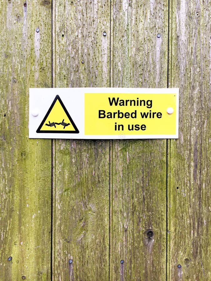 Barbed wire warning stock photo. Image of steel, public - 104990046
