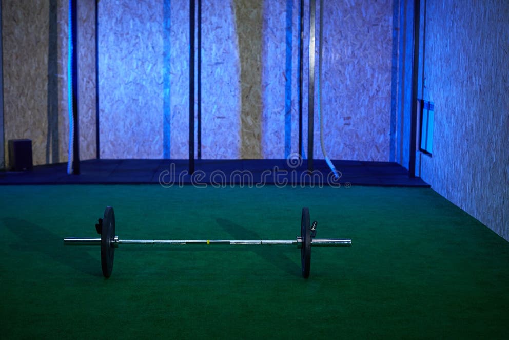 Barbell on the Floor in the Gym Stock Photo - Image of steel, inside ...