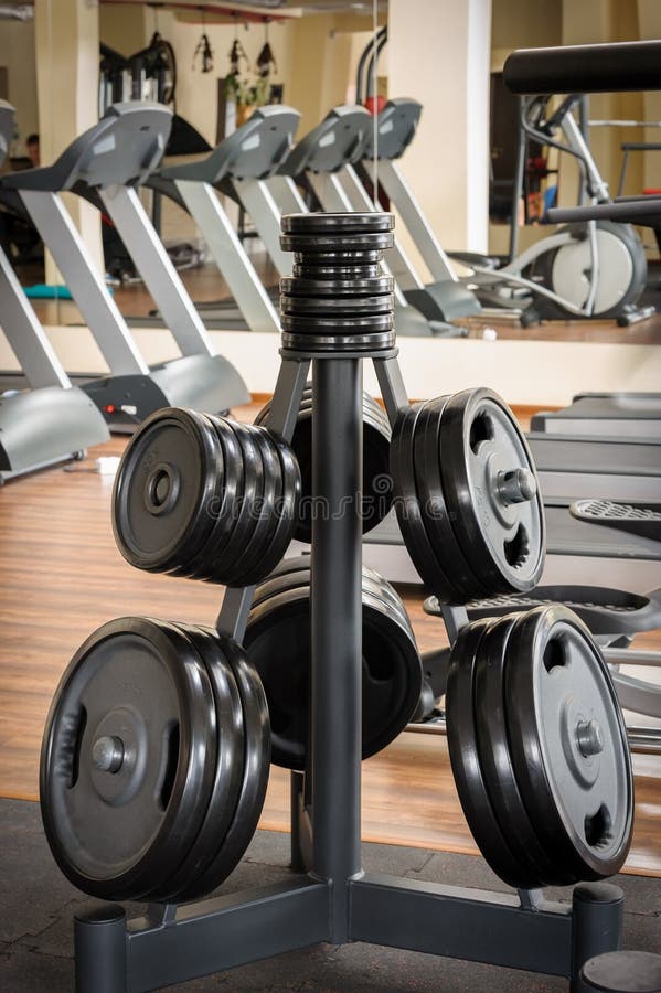 Barbell Plates Rack in the Gym Stock Image - Image of health, iron ...