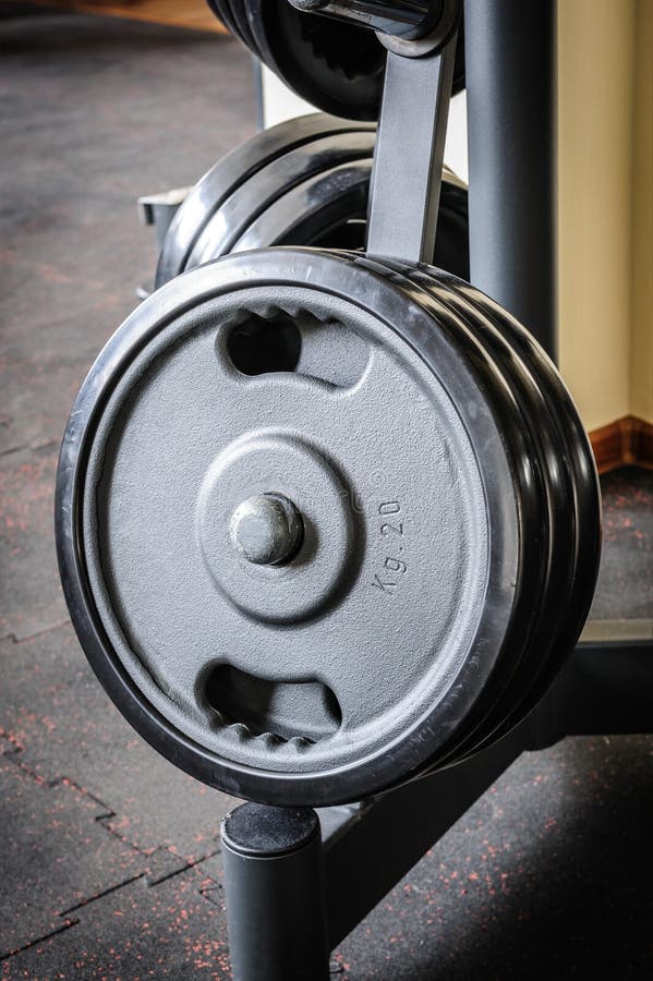 Barbell Plates Rack in the Gym Stock Photo - Image of treadmills ...