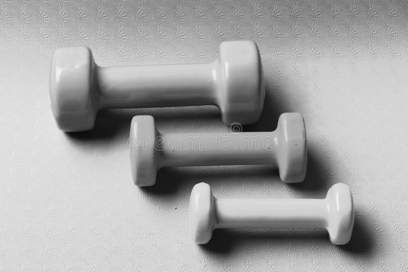 Barbells in Different Colors Placed in Pattern, Top View Stock Image ...