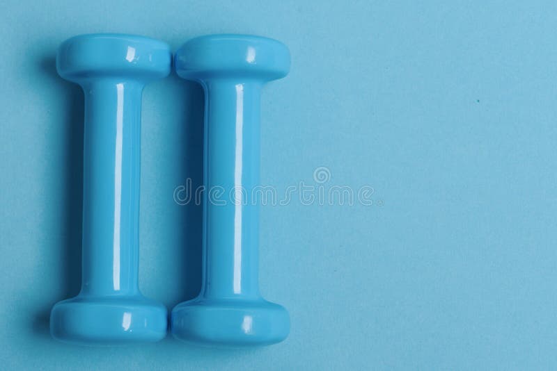 Barbells In Small Size, Topview. Dumbbells Made Of Blue Plastic Stock ... Barbells In Small Size, Topview. Dumbbells Made Of Blue Plastic Stock ...