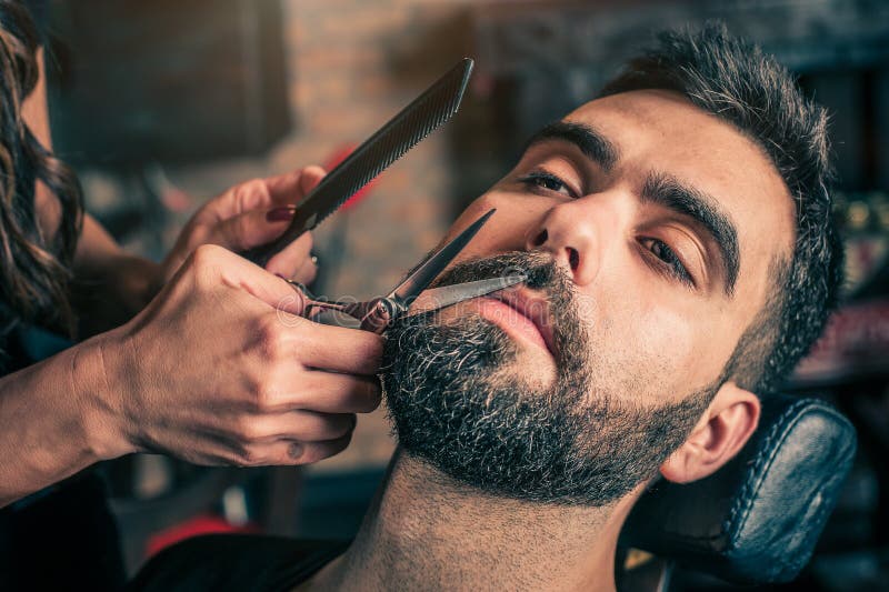 Barber Beard Cut a Client S Beard with Clippers Stock Photo - Image of ...