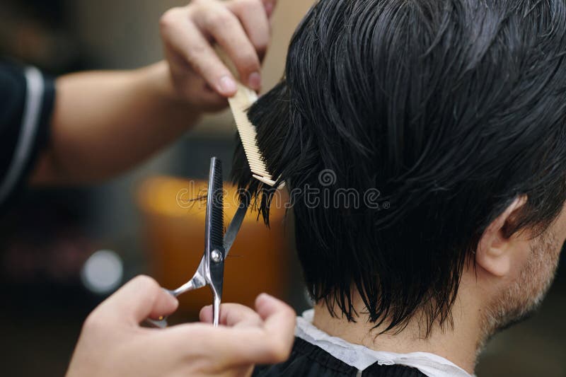 Combing through Section of Hair Stock Image - Image of barbershop ...