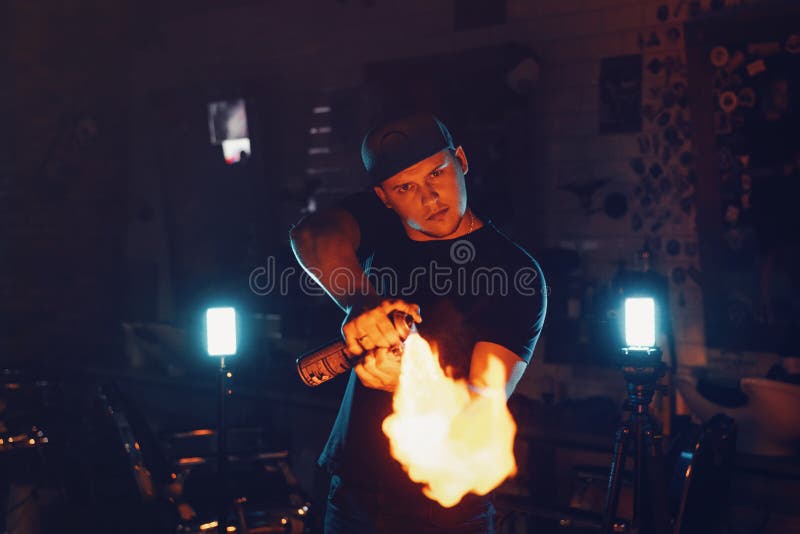 Barber Demonstrates Fire for Haircut with Hot Scissors Stock Photo ...