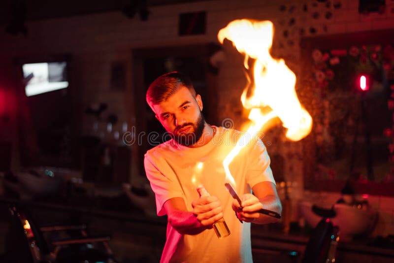 Barber Demonstrates Fire for Haircut with Scissors Stock Image - Image ...