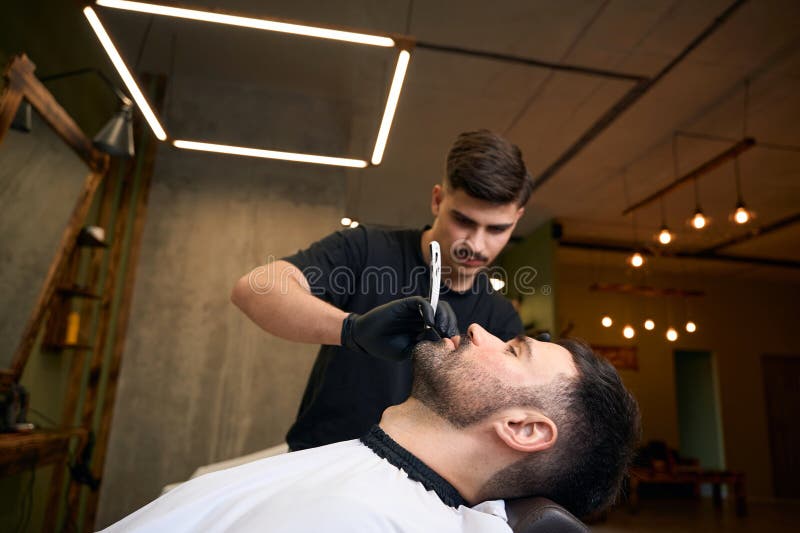 Barber Master Doing Beard Styling in Barbershop Stock Image - Image of ...