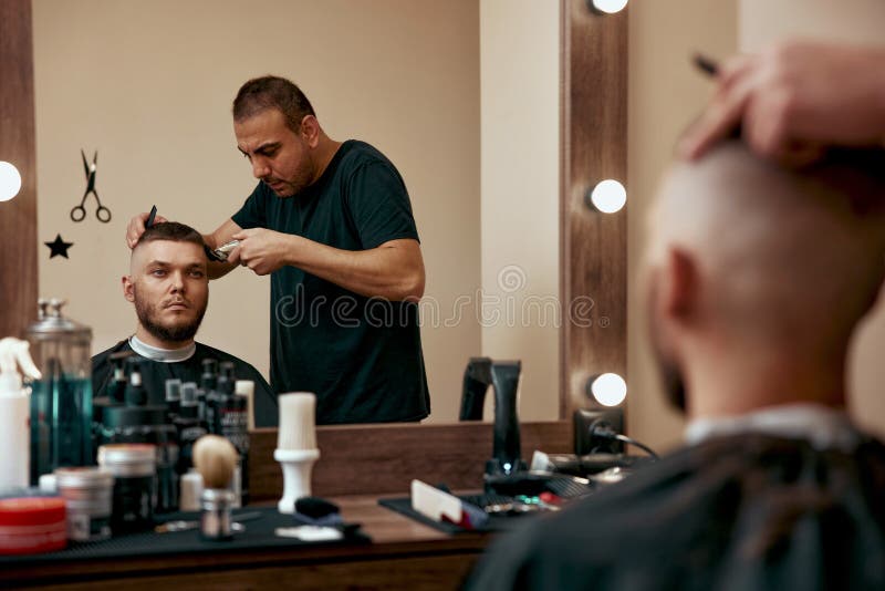 Barber Shaving Caucasian Man in Barber Shop Stock Photo - Image of ...