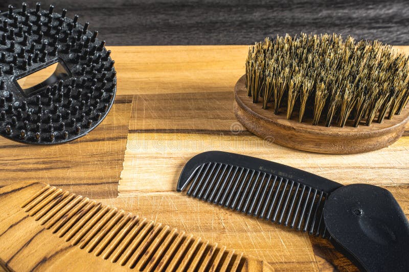 Barber Shop Flatlay, with Different Combs and Brushes on a Wooden Table ...