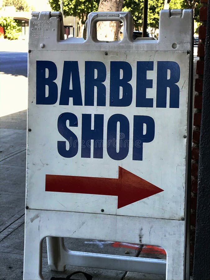 Barber shop sign stock image. Image of arrow, words - 212628773