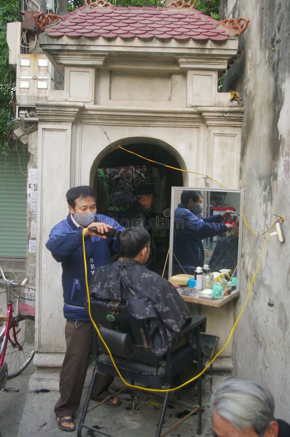 Barber Street in Hanoi editorial stock image. Image of scissors - 23335094