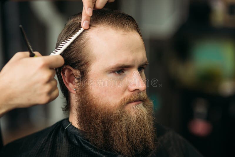 Barber Using Scissors and Comb in Barbershop Stock Image - Image of ...