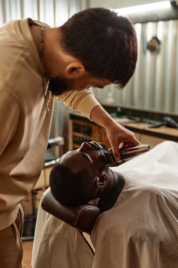 Man Shaving the Customer in Salon Stock Photo - Image of service ...