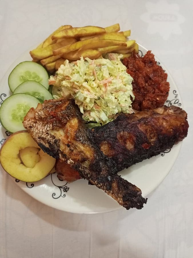 Barbque Fish and Turkey with Chips Stock Image - Image of chips ...