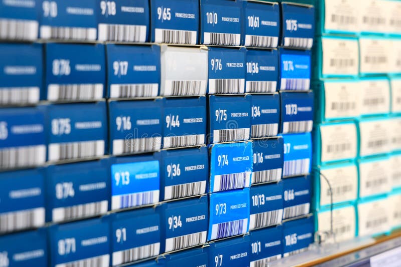 Barcode Organization on Shelves in Blue Packaging Display for ...