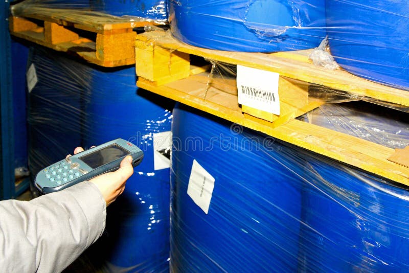 Barcode Scanner Reader. a Barcode Scan Products Stored in the Warehouse ...