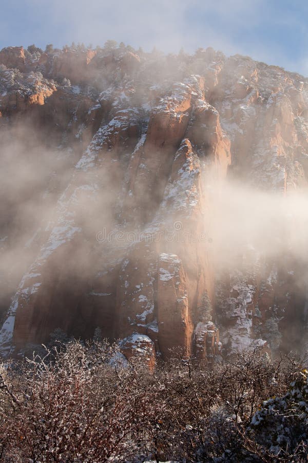 Bare Branches of Gambel Oak and Red Sandstone Cliffs with Snow and ...
