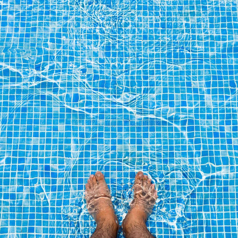 Bare Feet Cooling Off in the Pool Relaxing Concept Squ Stock Photo ...