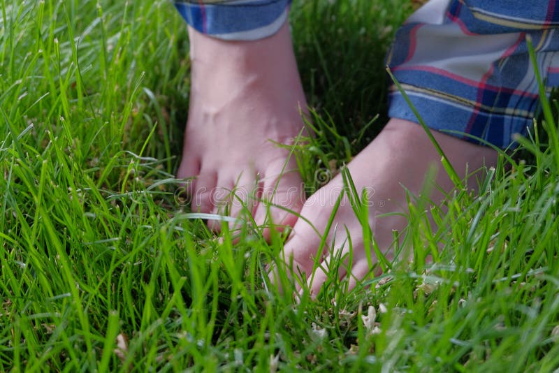 Bare Feet in Fresh Spring Grass. Stock Photo - Image of grass, leisure ...