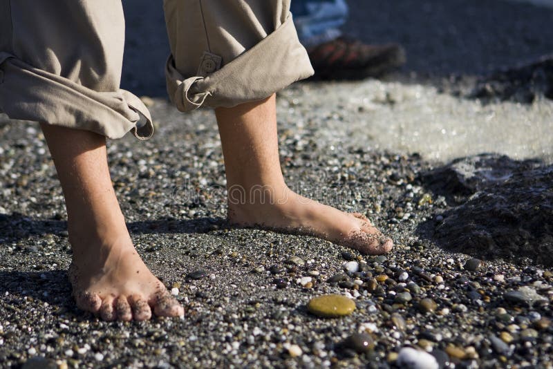 Bare feet pebbles stock image. Image of feet, shore, foot - 12423989