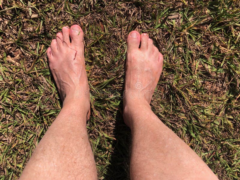 Bare Feet Stepping on the Grass and Dirt Floor Stock Photo - Image of ...