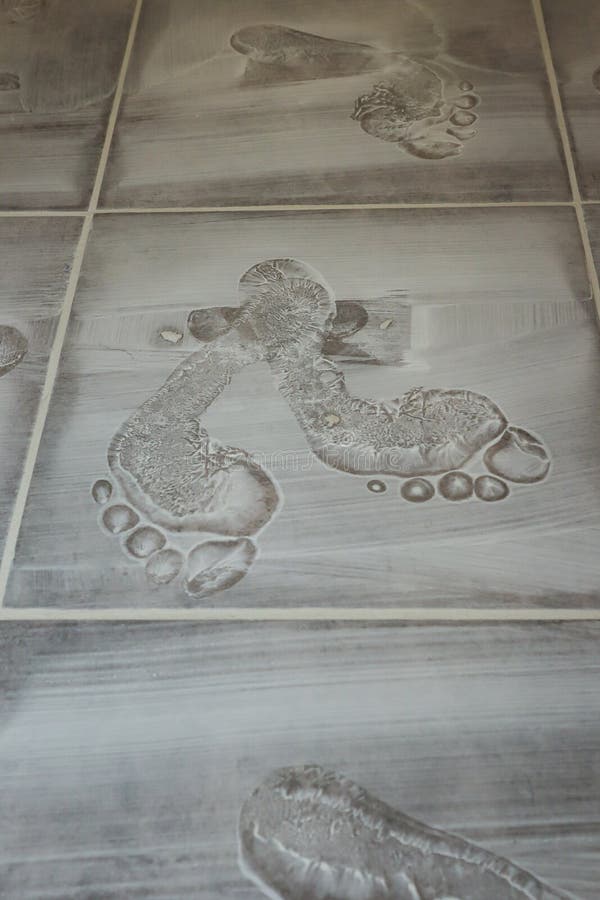 Multiple Footprints in Sand at the Beach on a Sunny Day. Foot Imprints ...