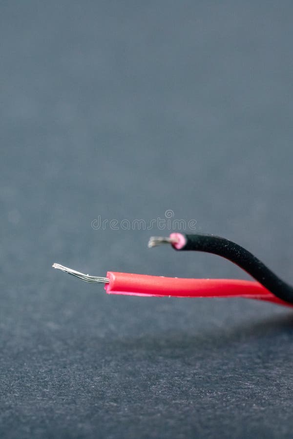 Bared Red Wire on a Black Background Stock Photo - Image of bare ...