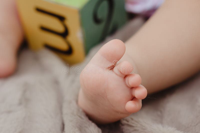 Barefoot baby stock image. Image of grass, barefoot, sitting - 98402557