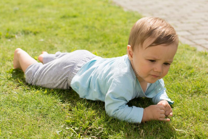 Barefoot Boy Crawling on the Grass Stock Photo - Image of happy ... Barefoot Boy Crawling on the Grass Stock Photo - Image of happy ...