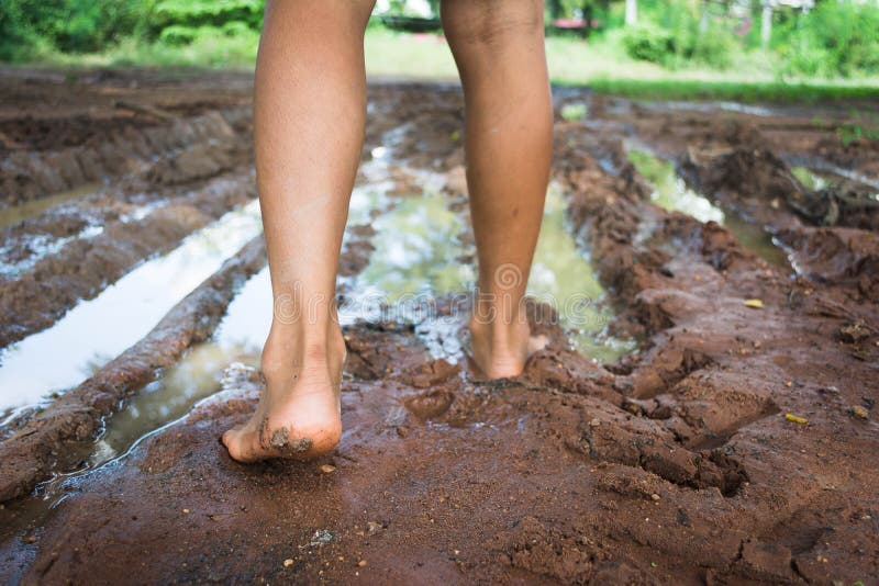 Barefoot through Muddy Road Stock Image - Image of ground, park: 80595679