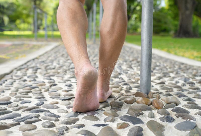Barefoot Old Man Stepping on Stones,foot Reflexology at the Park Stock ...