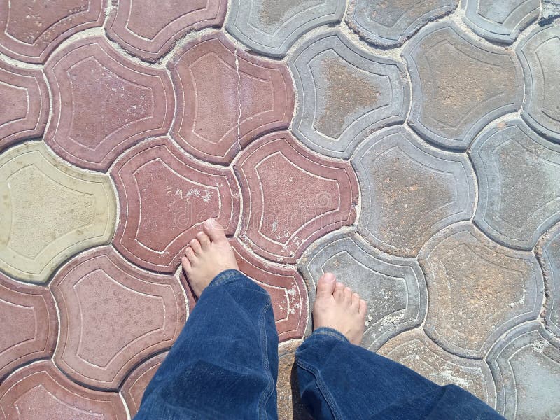 A Barefoot Person Walking on the Ground in the Sun Stock Photo - Image ...