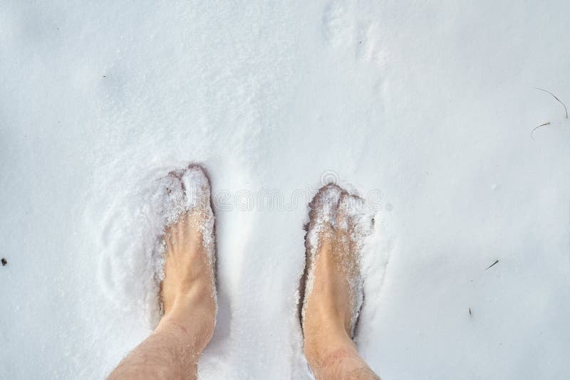 Barefoot in the snow stock photo. Image of foot, cool - 235981180