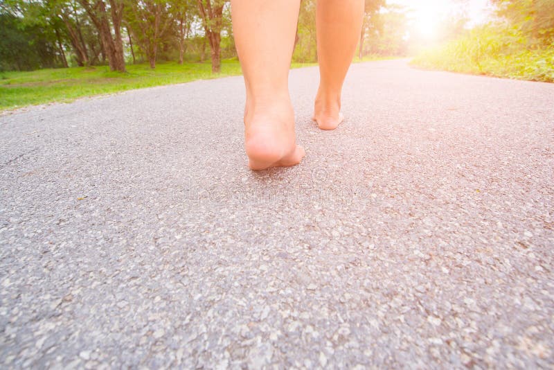 Barefoot walking on street stock image. Image of foot - 303123007