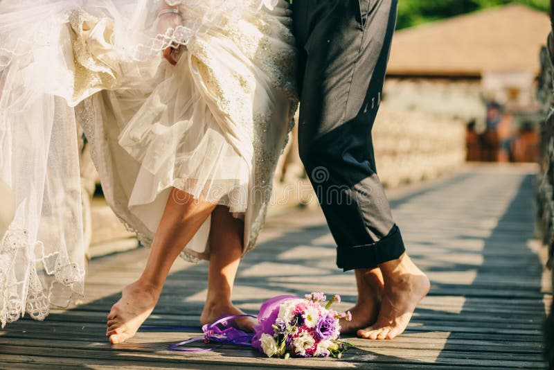 Barefoot Wedding Couple stock image. Image of relaxing - 85134567