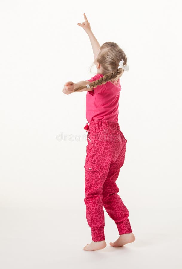 Barefooted Little Girl Turning Back Indicating Something Up Stock ...
