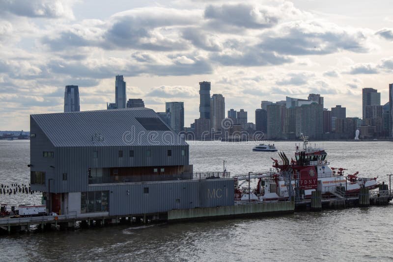Barge Entering the Water Near a City Skyline Editorial Stock Image ...