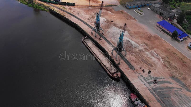 Barge Loading Sand at River Port with Cranes during Daytime Aerial View ...