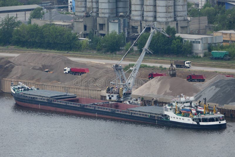 Barge on the River Unloading River Sand from a Barge Navigable River ...
