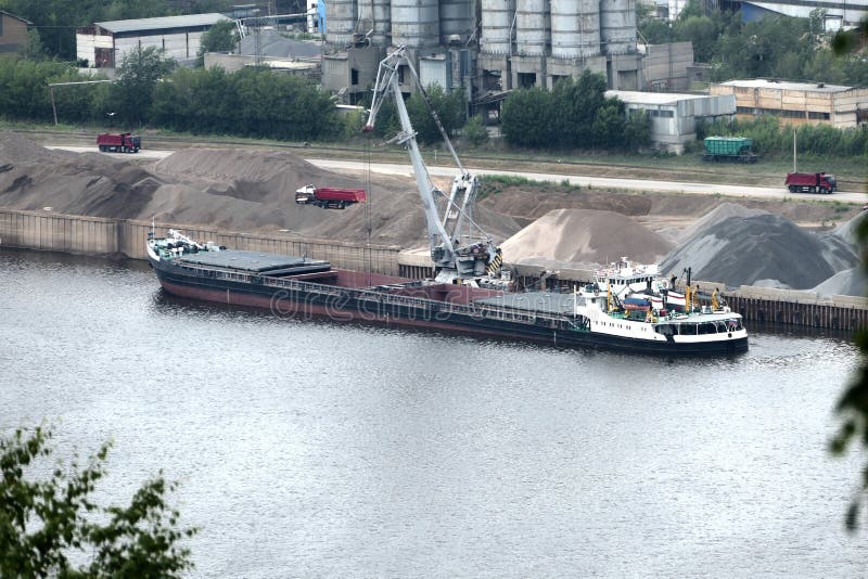 Barge on the River Unloading River Sand from a Barge Navigable River ...