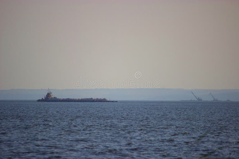 Barge on the sea stock photo. Image of nautical, logistics - 84526308