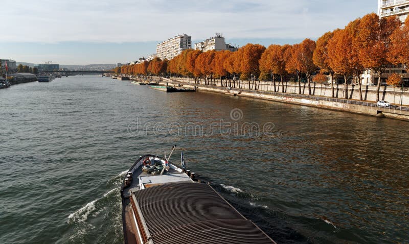 Barge on Seine River in Paris Editorial Image - Image of paris, tourism ...