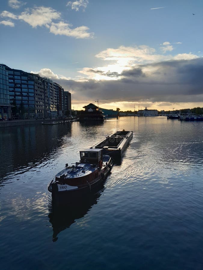 Barge with Transport Containers Approaching on Water in Amsterdam, with ...