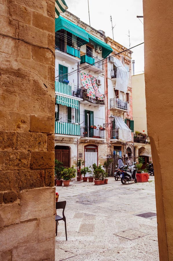 Bari, Italy - May 30 - Tourists Walking Down the Narrow Street in Bari ...