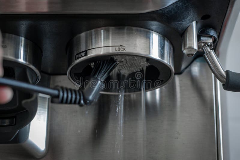 Barista Cleaning Group Heads of Coffee Machine Stock Image - Image of ...