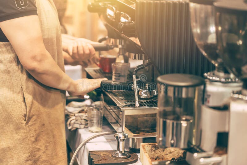 Barista with Coffee Machine in the Cafe Vintage Tone. Stock Image ...