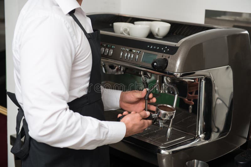 Barista doing your coffee stock photo. Image of industrial - 43545368