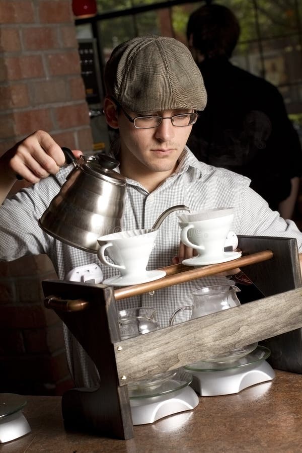 Barista Focuses On Brewing Coffee Stock Photo - Image of barista ...
