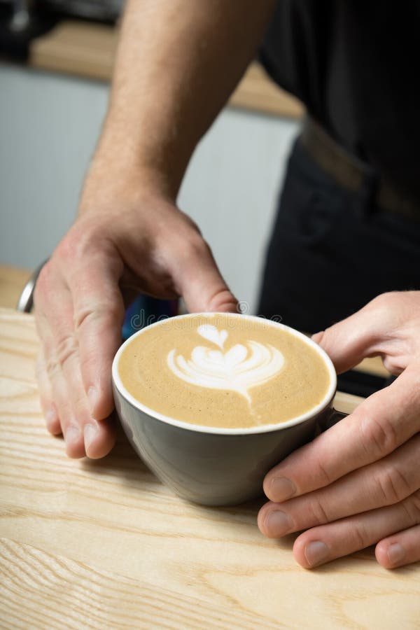 Barista Hands Serving Coffee Latte with Art Stock Image - Image of ...