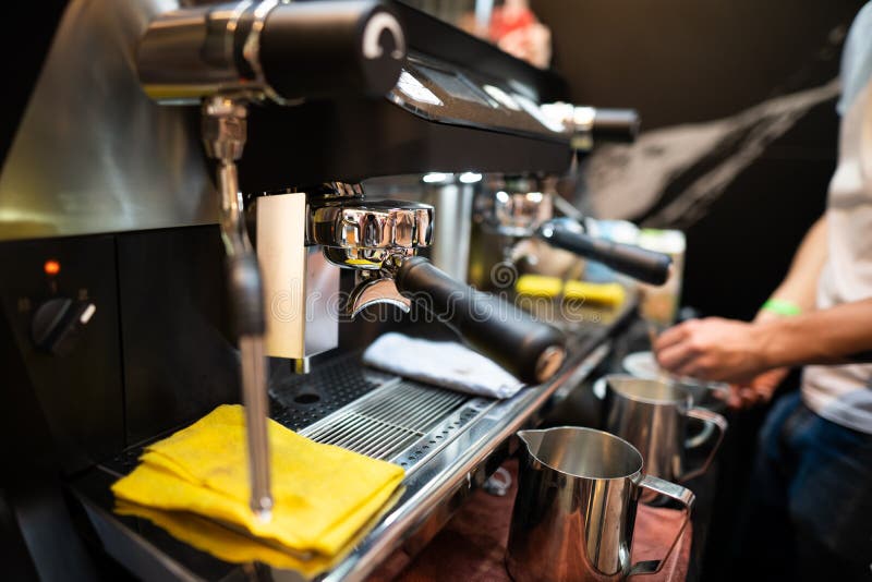 Barista Makes Coffee in a Coffee Machine. Stock Photo - Image of ...